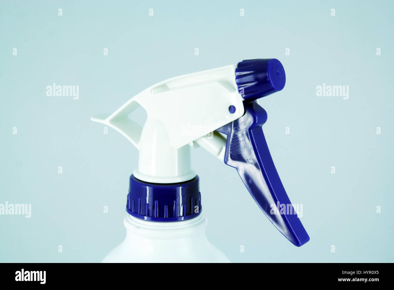 Watering sprayer. Blue and white plastic bottle sprayer Stock Photo - Alamy