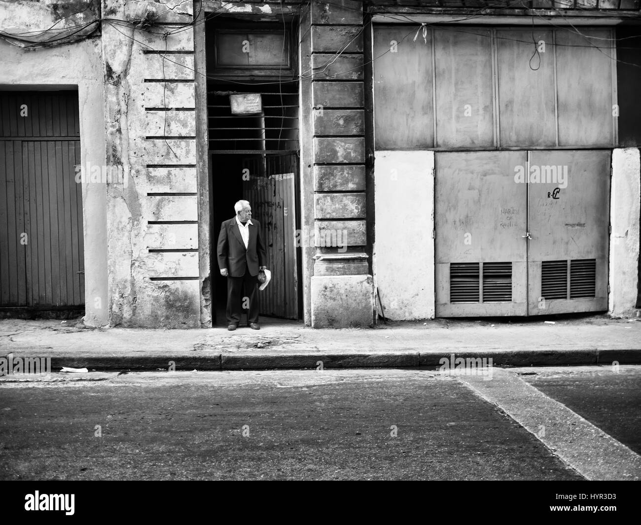 Man leaving house Black and White Stock Photos & Images - Alamy