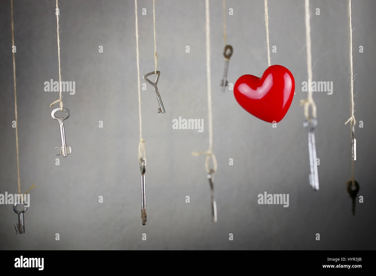 hand stretching for one of the many old vintage keys Stock Photo - Alamy