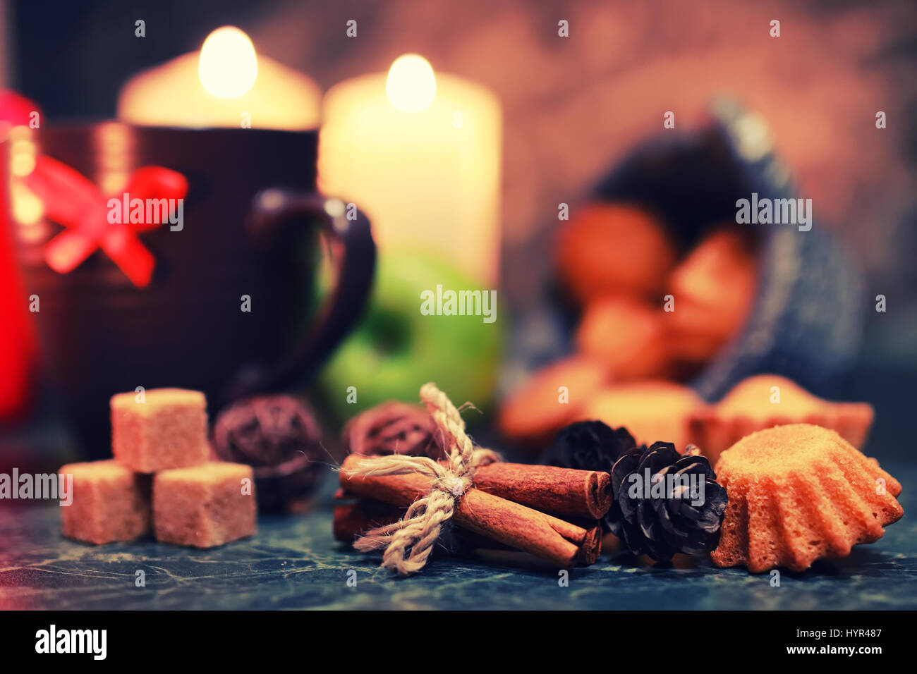 night table with mug and candle Stock Photo - Alamy