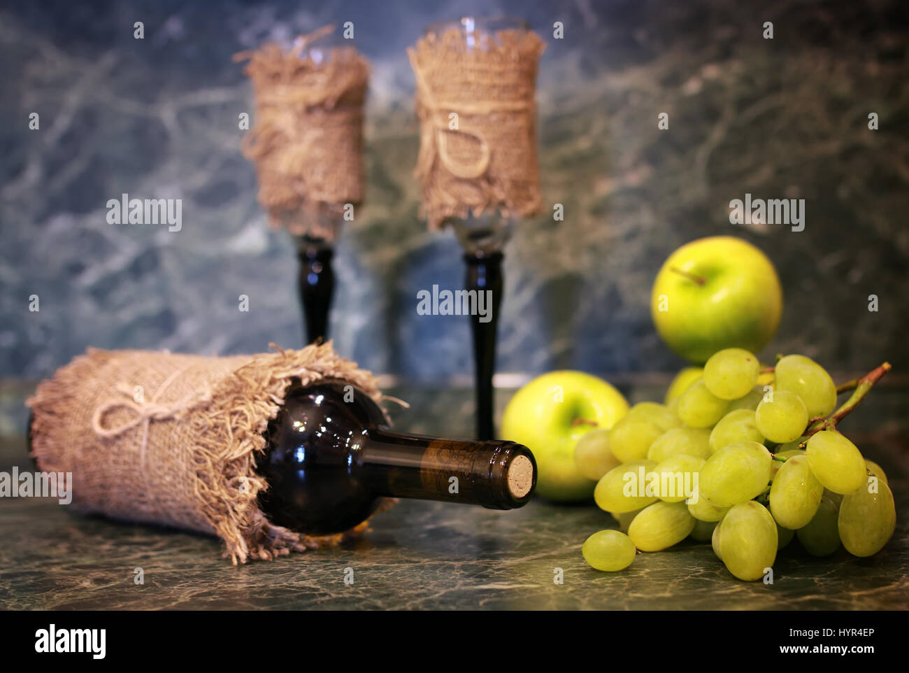 table with wine bottle grape Stock Photo - Alamy
