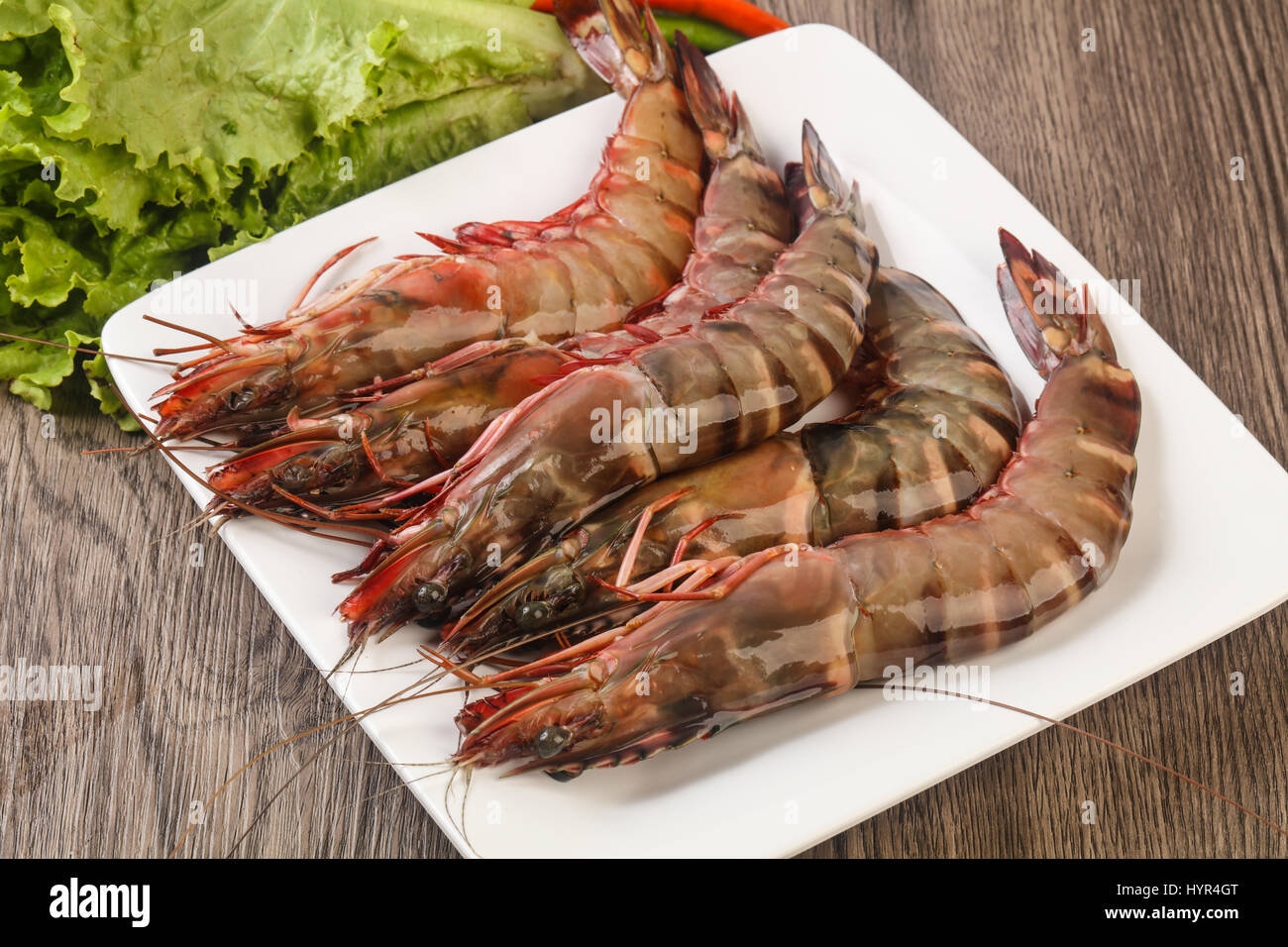 Raw big tiger prawn - ready for cooking Stock Photo - Alamy