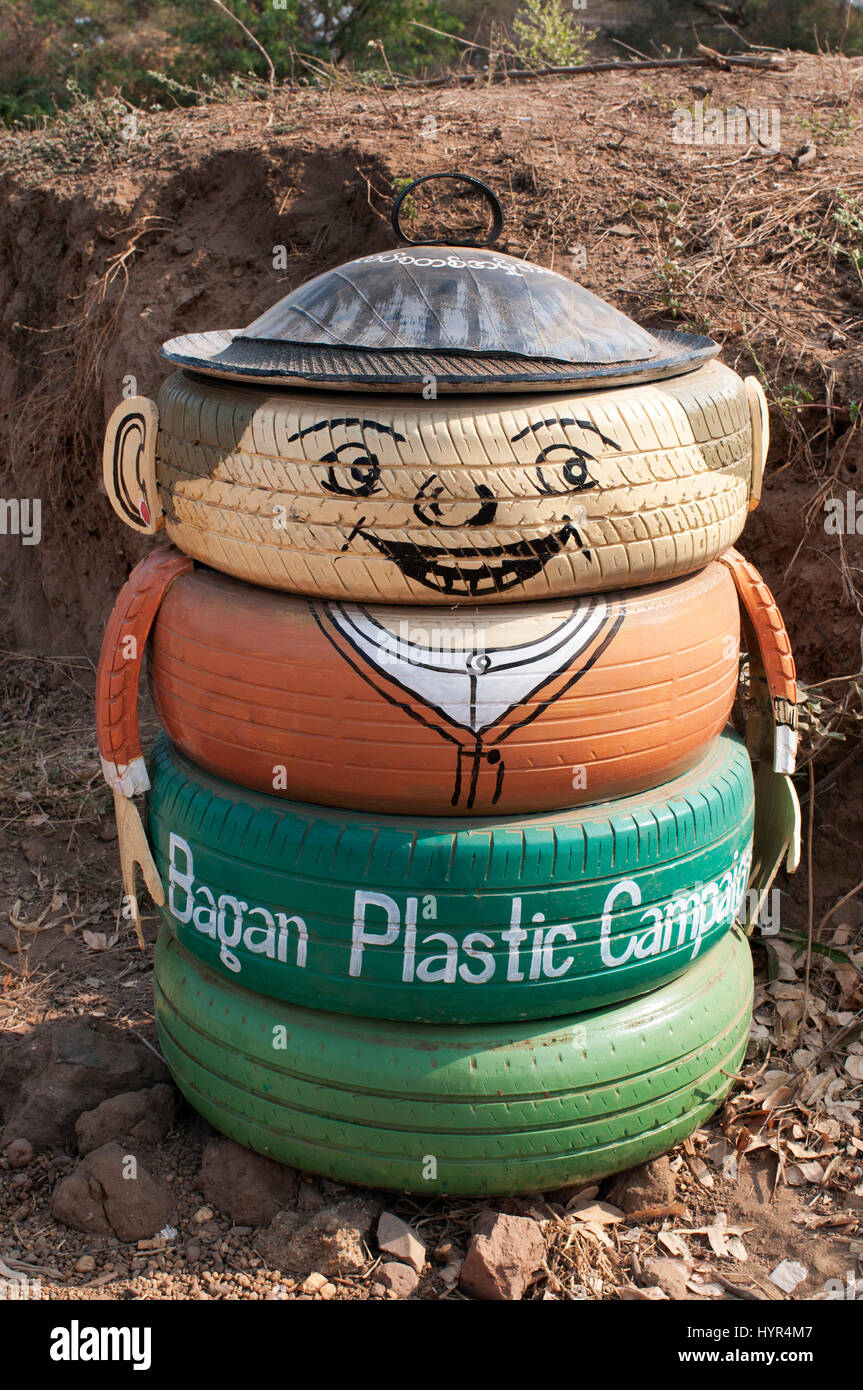 Myanmar (Burma). Bagan. Rubbish bin made out of car tyres encouraging ...