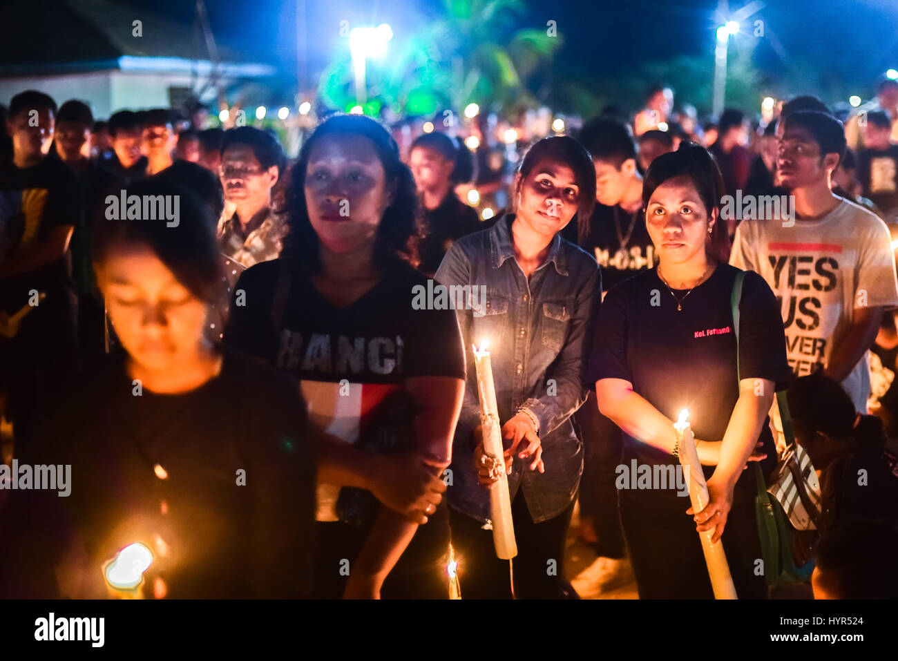 Roman-Catholic pilgrims carrying lit candles during Semana Santa (Holy ...