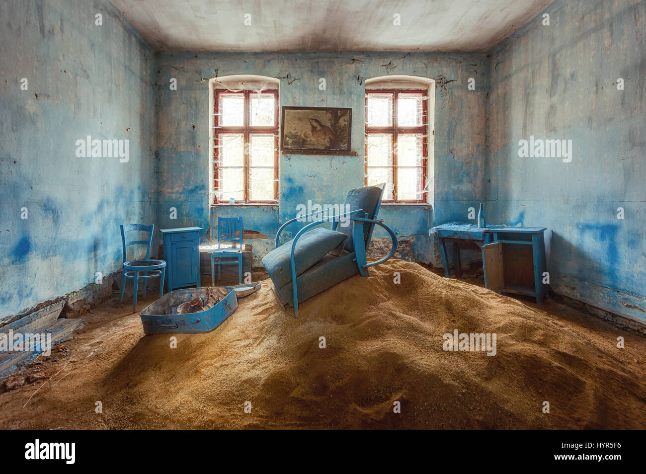 An abandoned sand-filled room. SPOOKY images of what could be the most ...