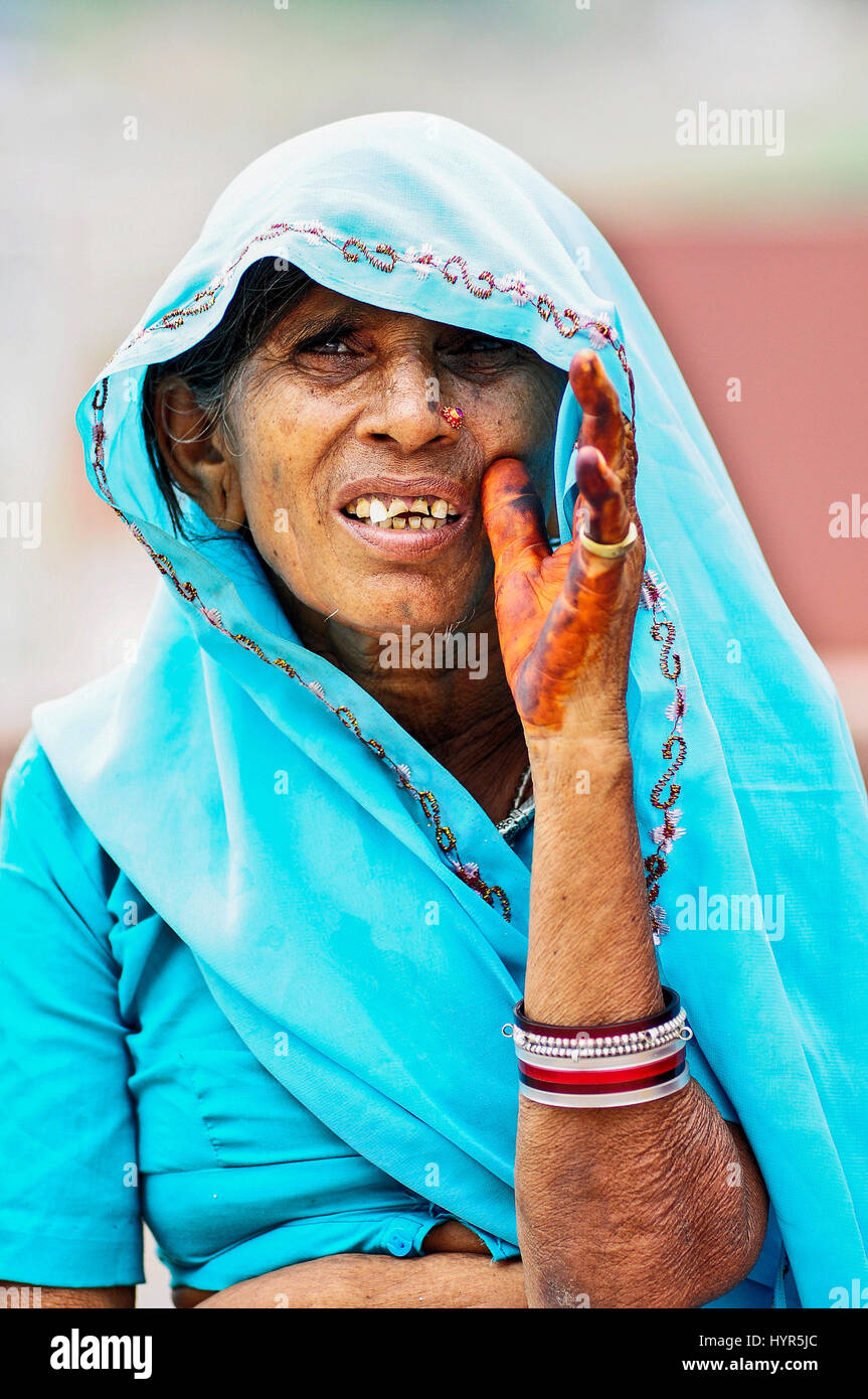 Jodhpur, India, september 10, 2010: Old Indian woman in blue saree ...