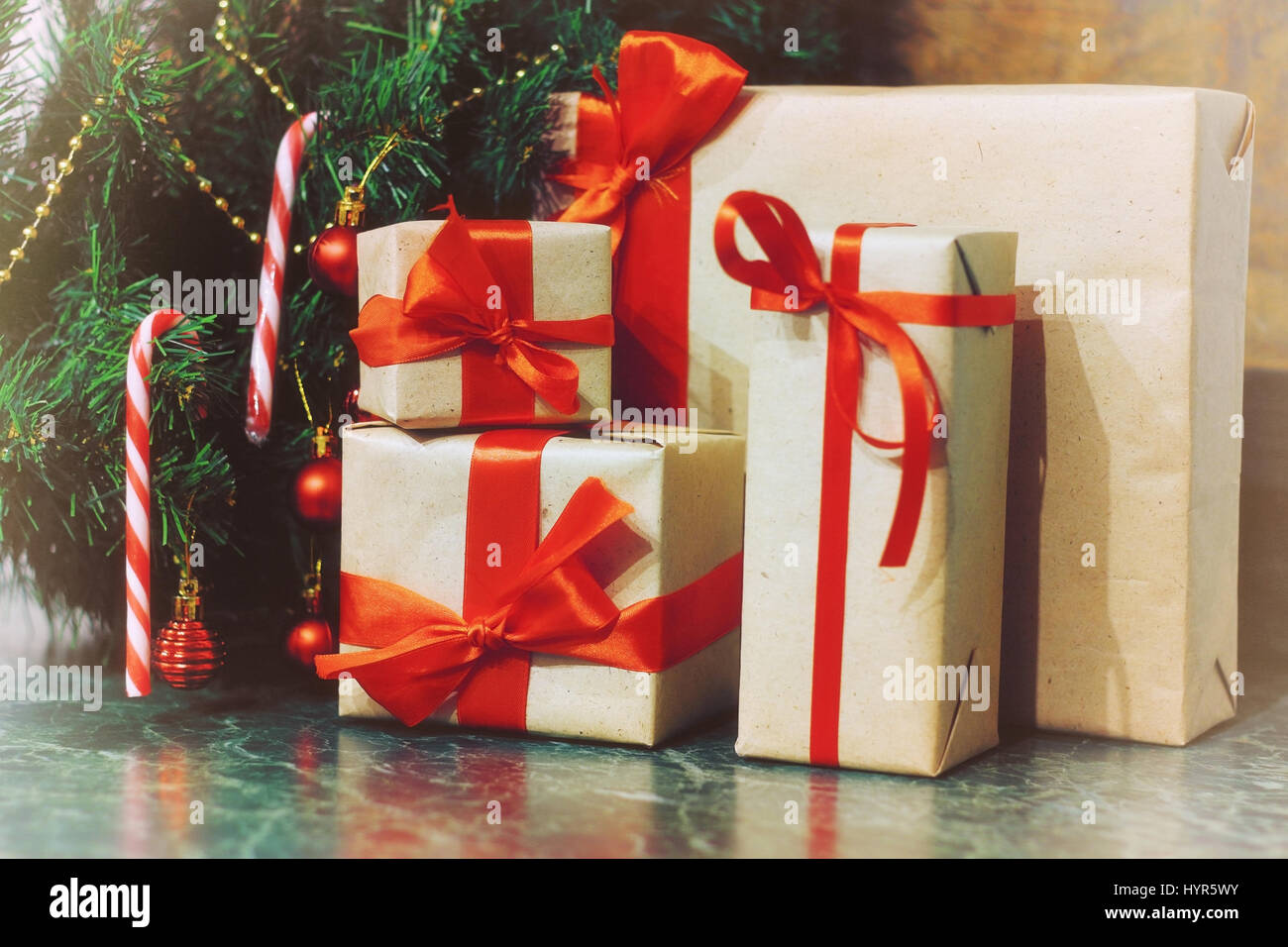 stack of gifts under a Christmas tree Stock Photo - Alamy