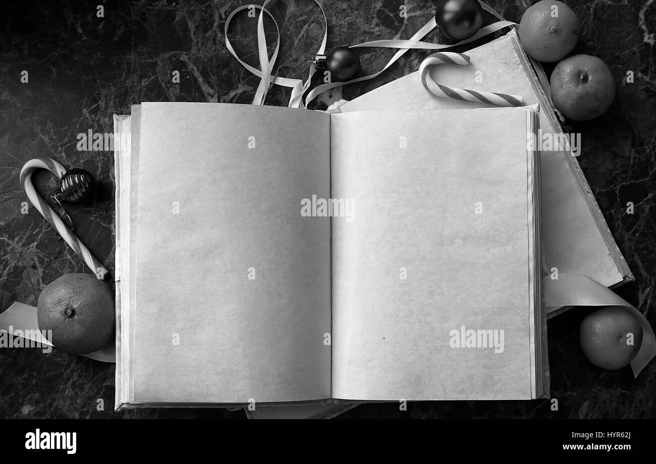 blank pages opened vintage book on the table Stock Photo - Alamy