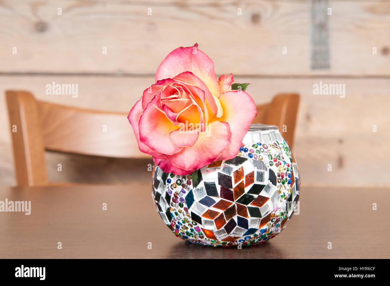 single rose flower in ornamental vase on the table Stock Photo - Alamy