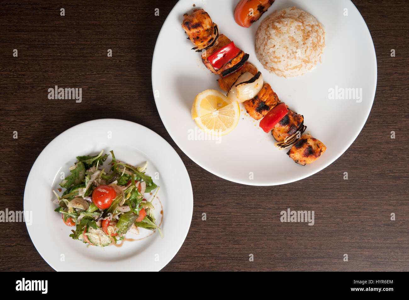 Grilled meat dish of shish kebab with onion Stock Photo - Alamy