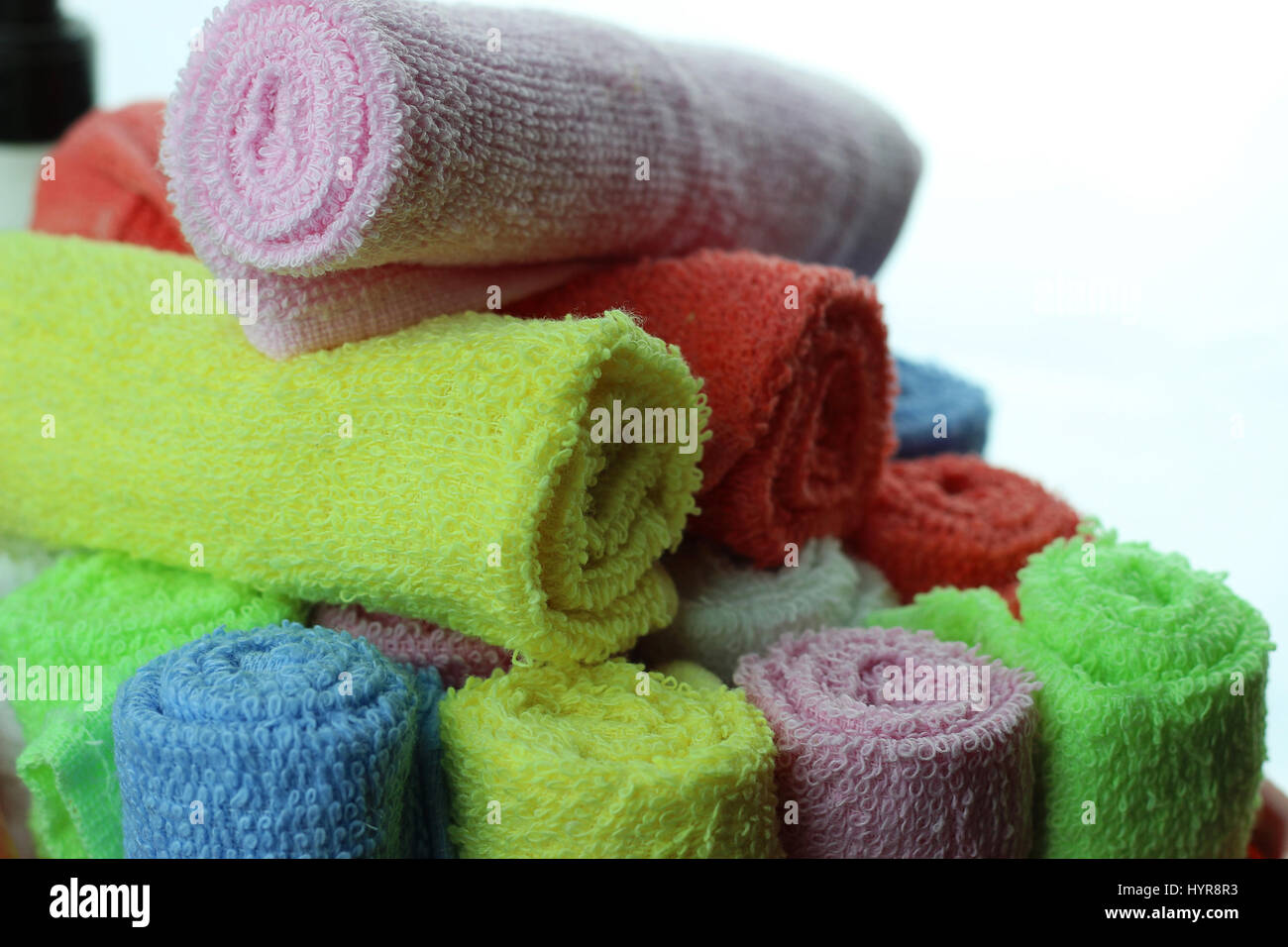 set of multi-colored towels Stock Photo - Alamy