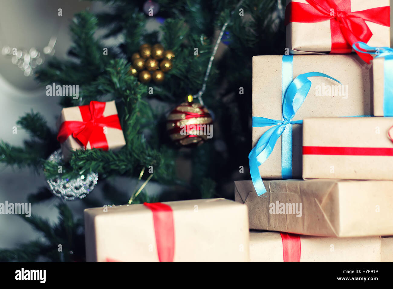 gift stack under tree Stock Photo - Alamy