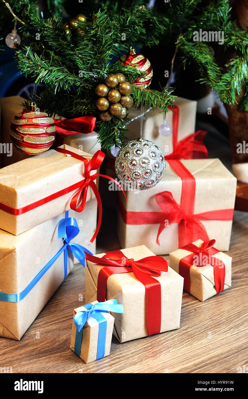 gift under tree christmas ball Stock Photo - Alamy