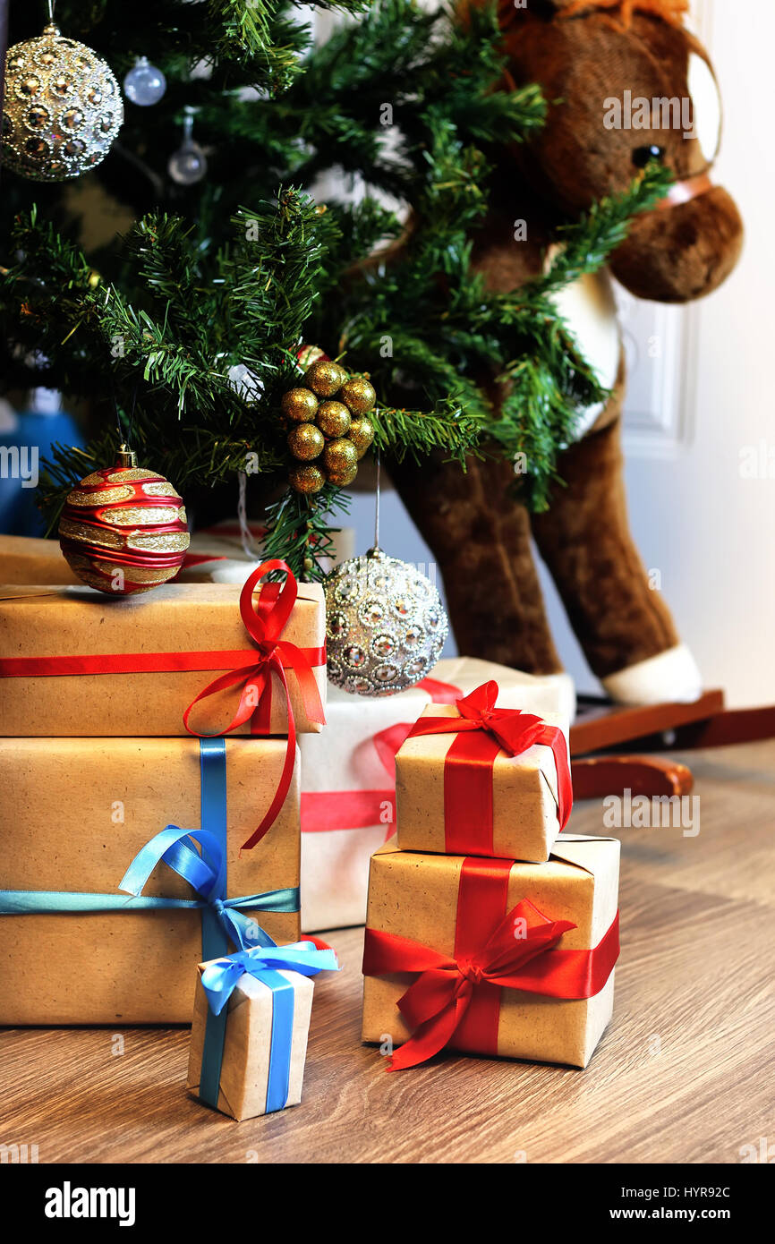 gift under tree christmas ball Stock Photo - Alamy