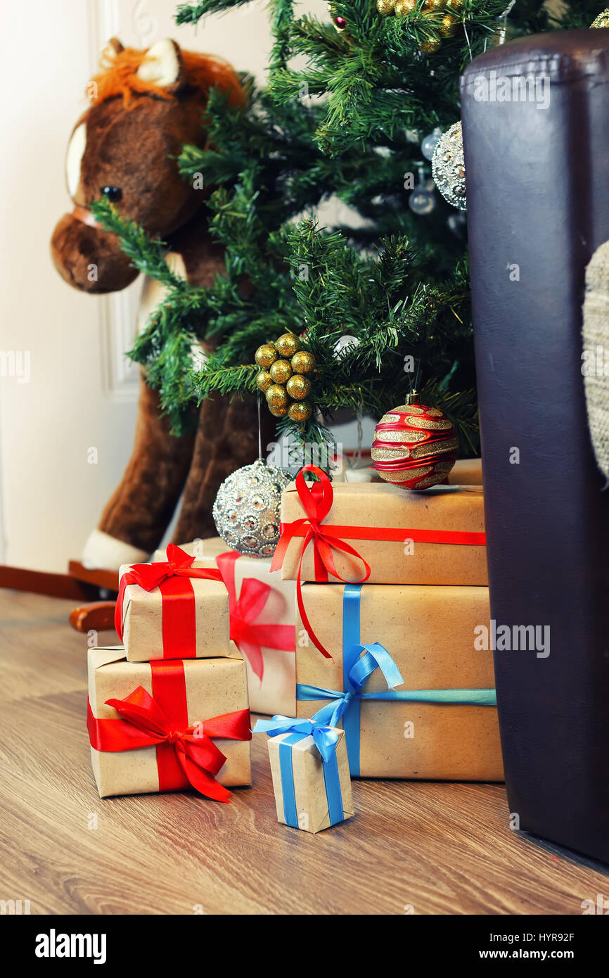 gift stack under tree Stock Photo - Alamy