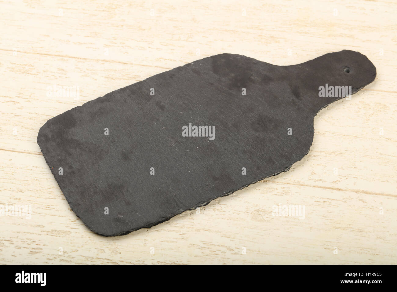 Black stone plate for home and restorant use Stock Photo - Alamy
