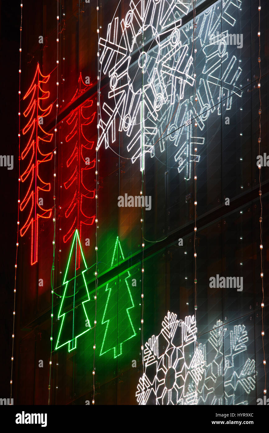 Christmas lights decoration on a building facade. Vertical Stock Photo ...