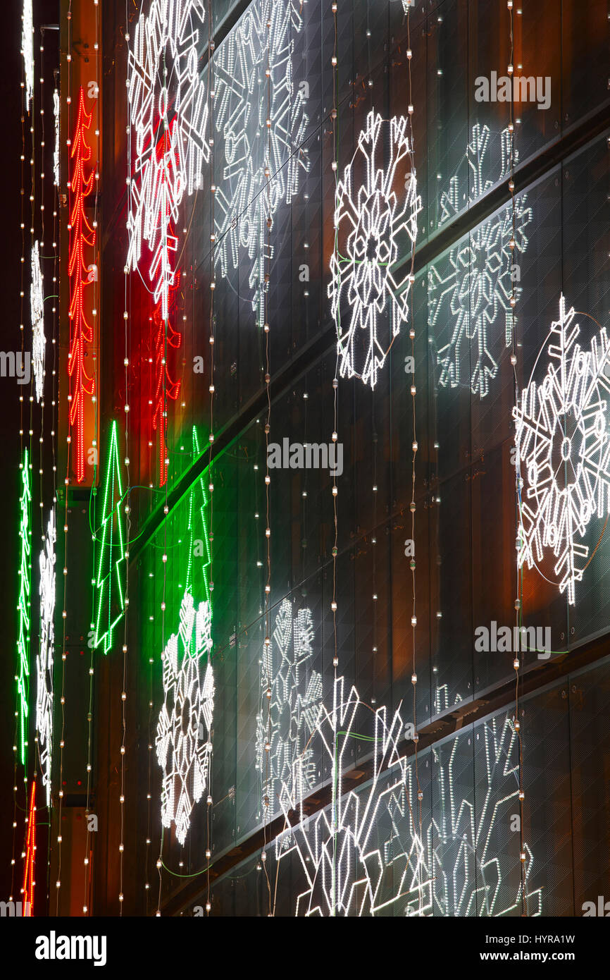 Christmas lights decoration on a building facade. Vertical Stock Photo ...