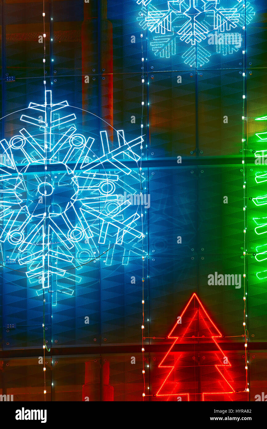 Christmas lights decoration on a building facade. Vertical Stock Photo ...