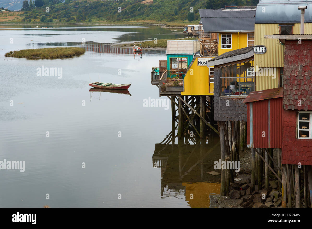 Palafitos. Traditional wooden houses built on stilts along the waters ...