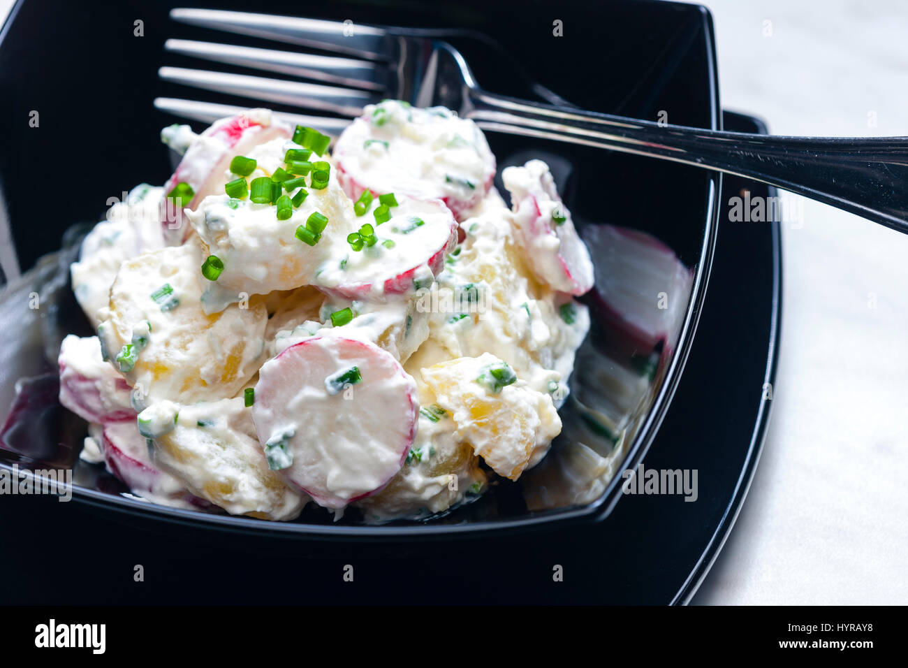 spring potato salad with radishes Stock Photo - Alamy