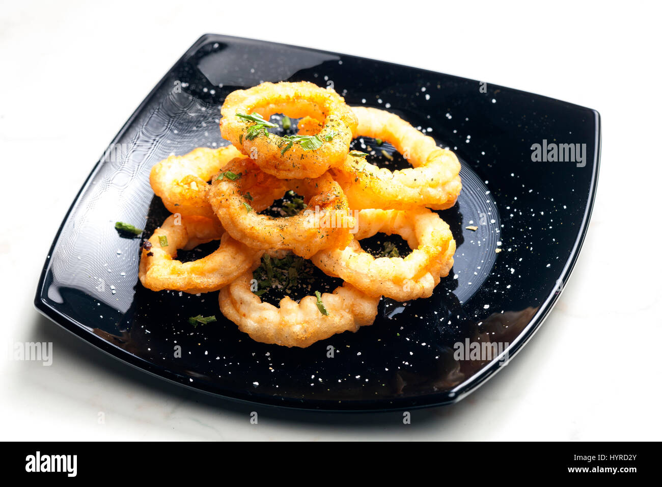 fried cuttlefish rings in batter Stock Photo - Alamy