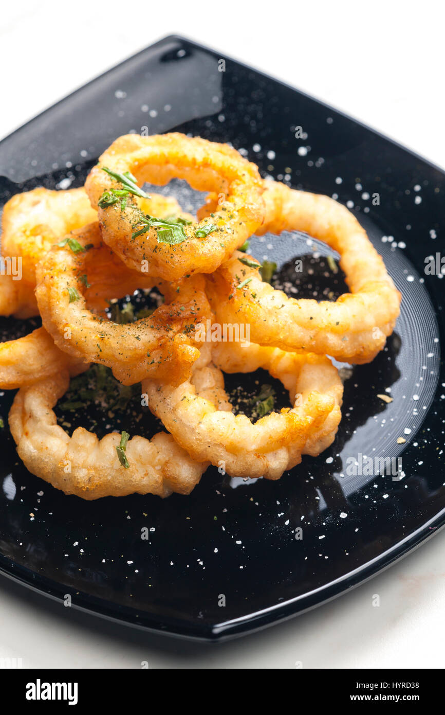 fried cuttlefish rings in batter Stock Photo - Alamy