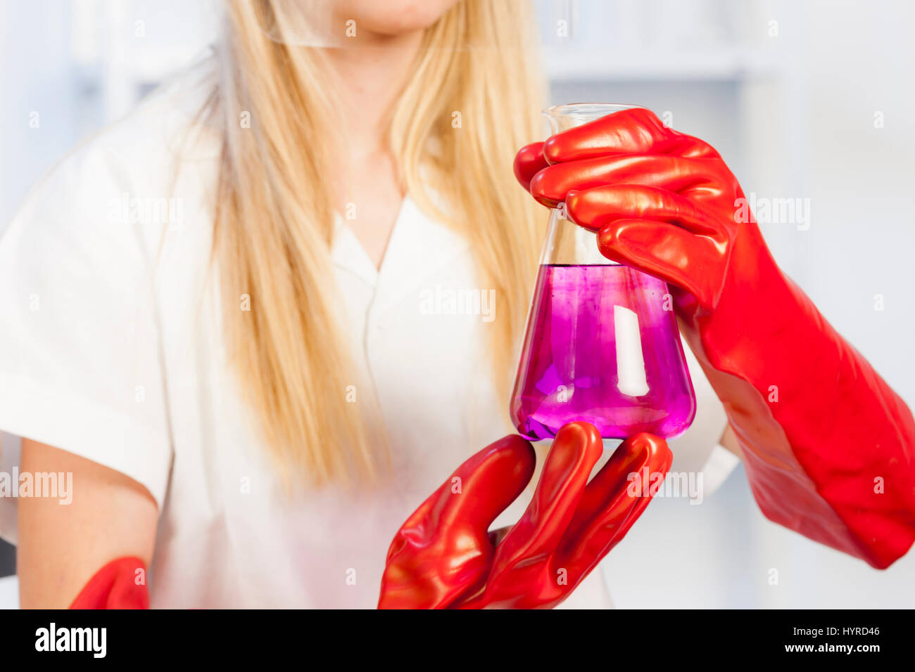 detail of woman doing experiment in laboratory Stock Photo - Alamy