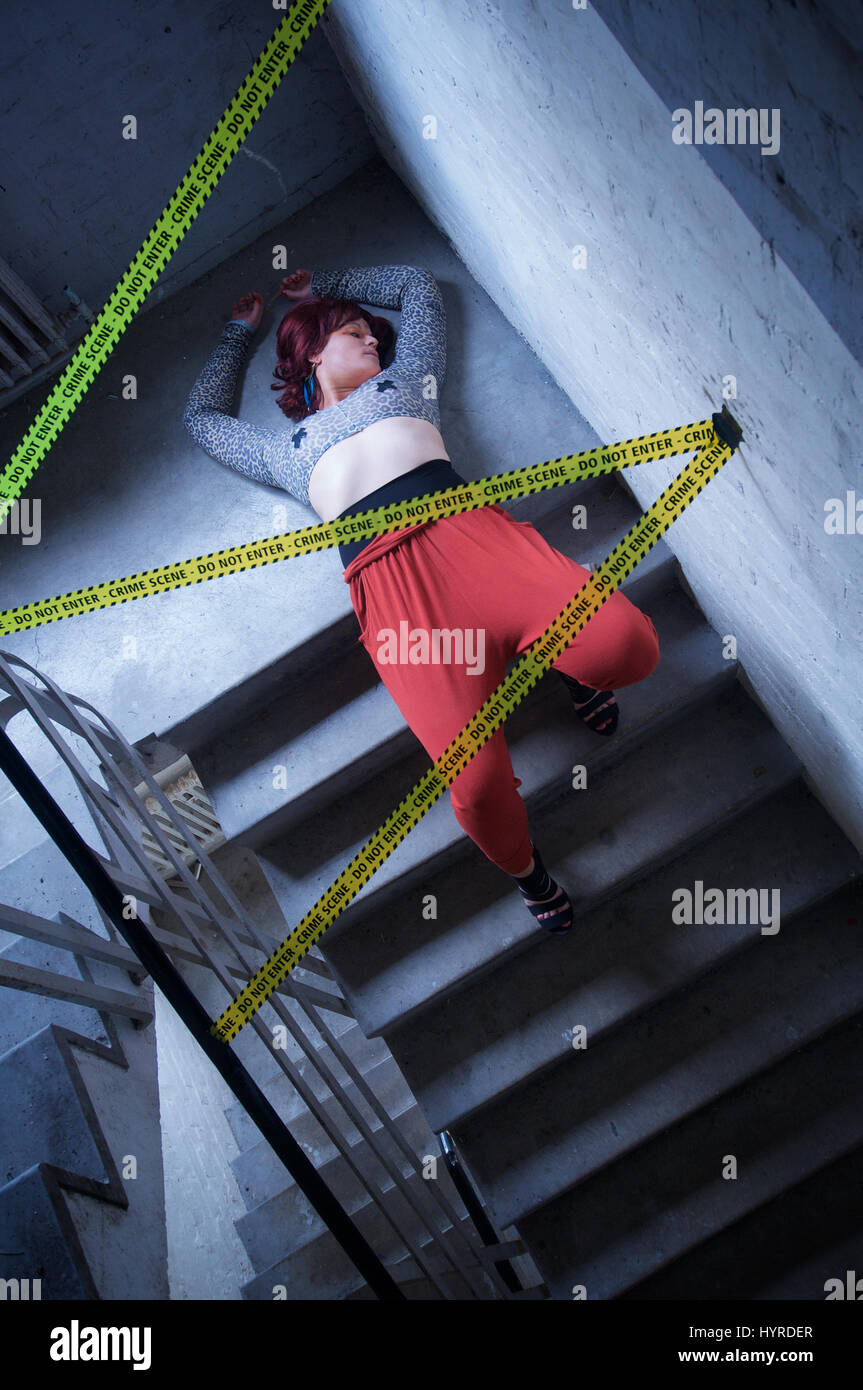 Model posing as a victim of crime at a crime scene indoors Stock Photo ...