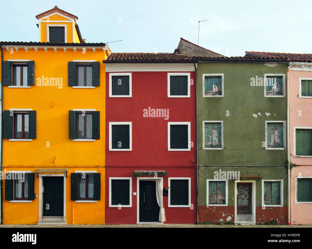 A row of painted houses in Burano Venice Stock Photo - Alamy