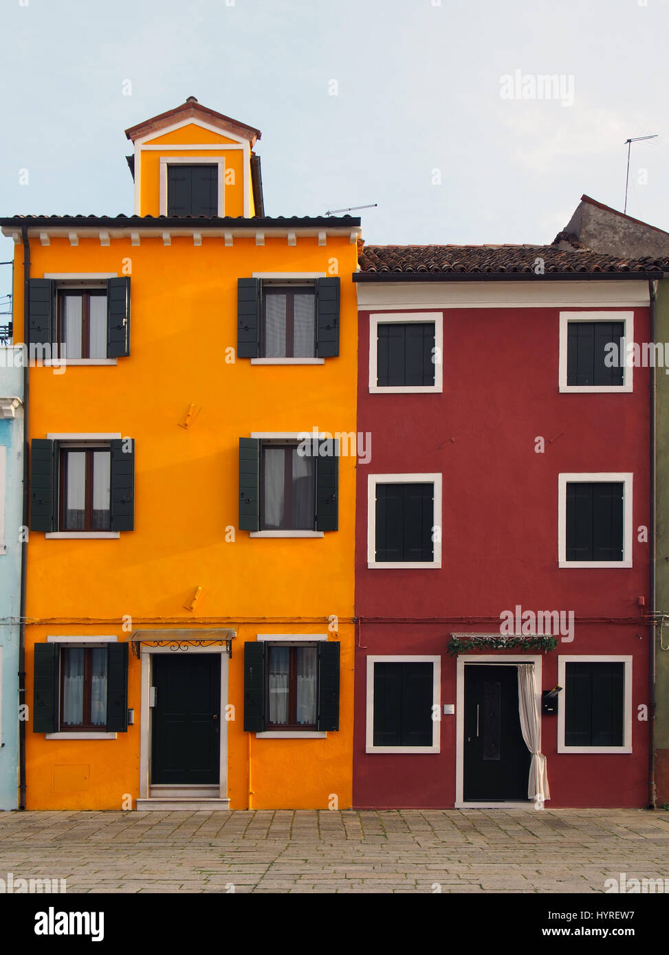 Two painted houses in Burano Venice Stock Photo - Alamy