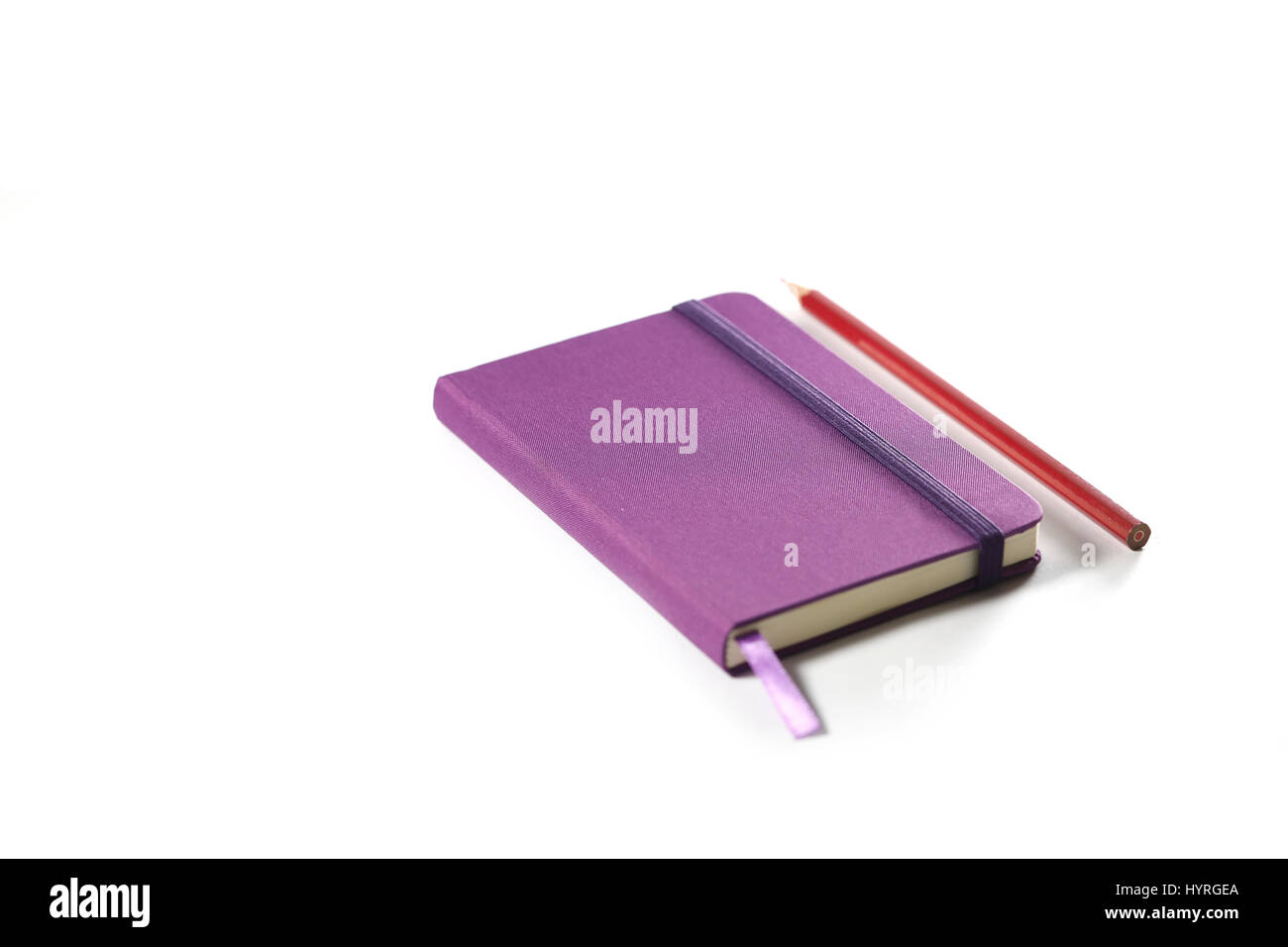 Pencil, notebook isolated on white background Stock Photo - Alamy