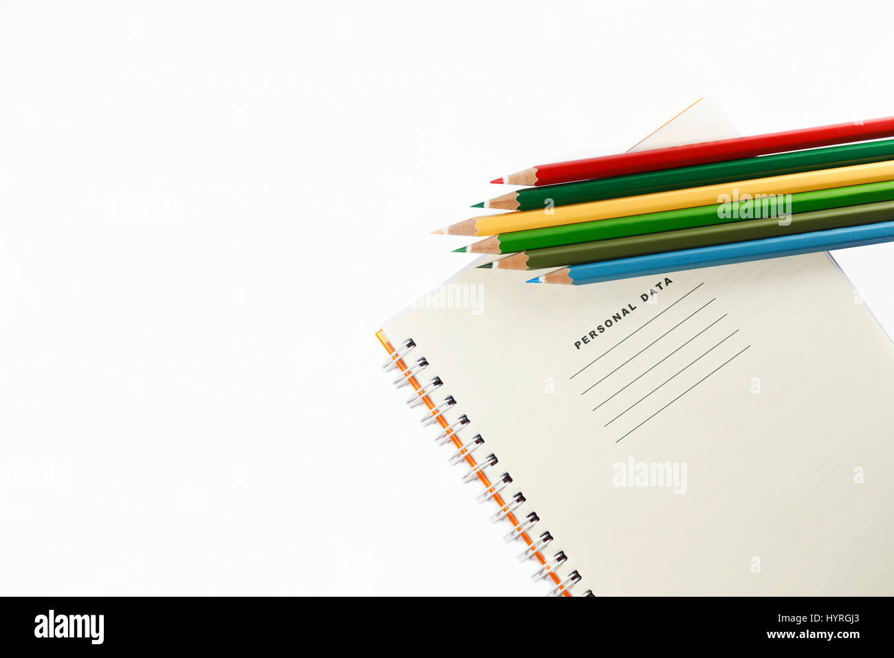 Pencil, notebook isolated on white background Stock Photo - Alamy