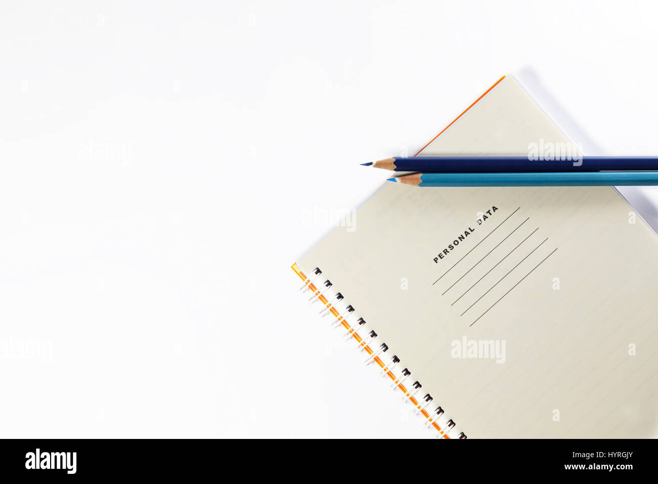 Pencil, notebook isolated on white background Stock Photo - Alamy