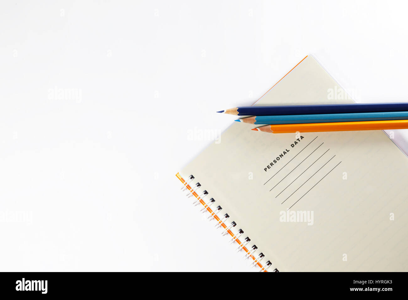 Pencil, notebook isolated on white background Stock Photo - Alamy