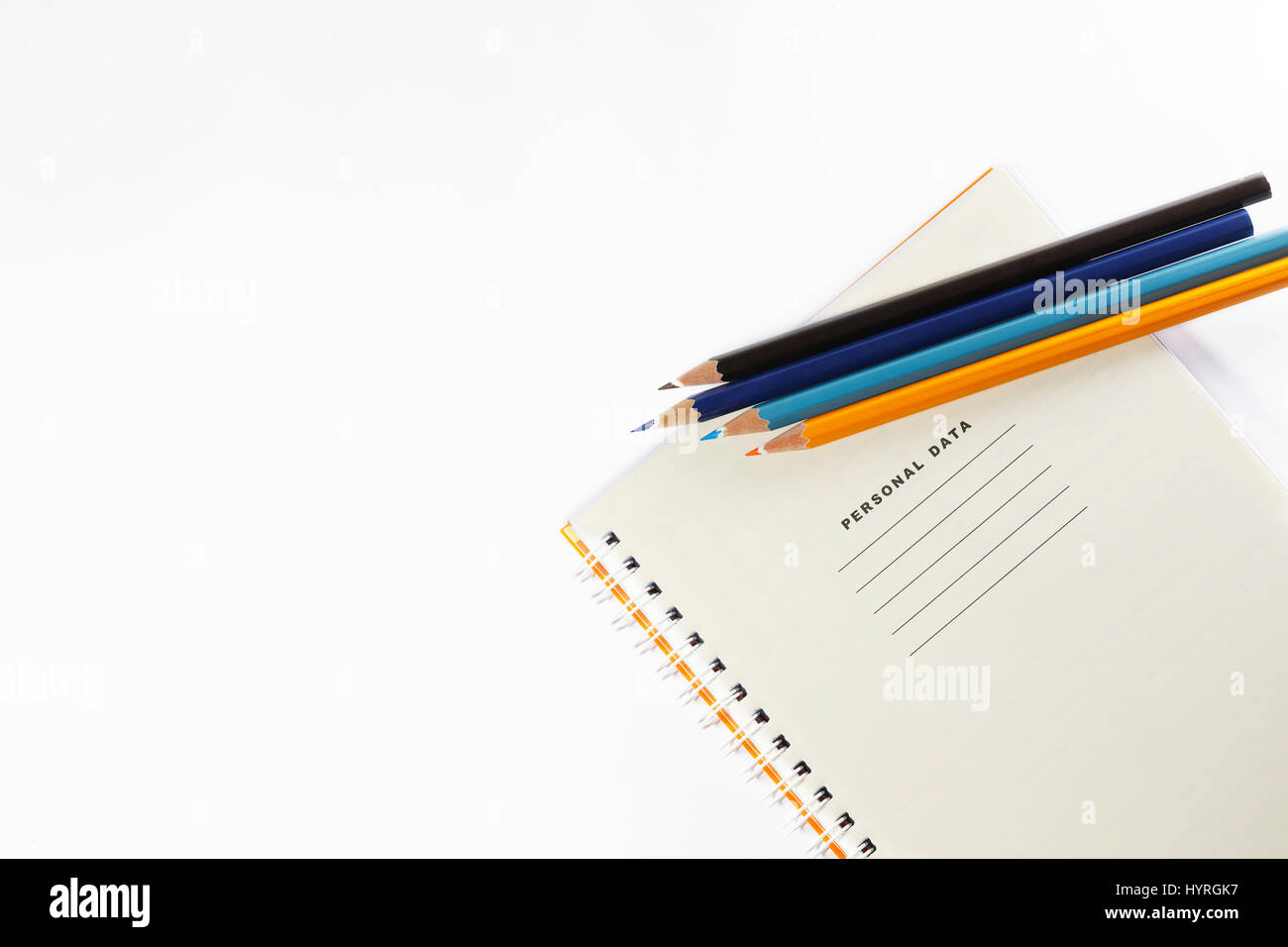 Pencil, notebook isolated on white background Stock Photo - Alamy