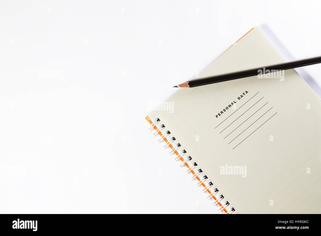 Pencil, notebook isolated on white background Stock Photo - Alamy