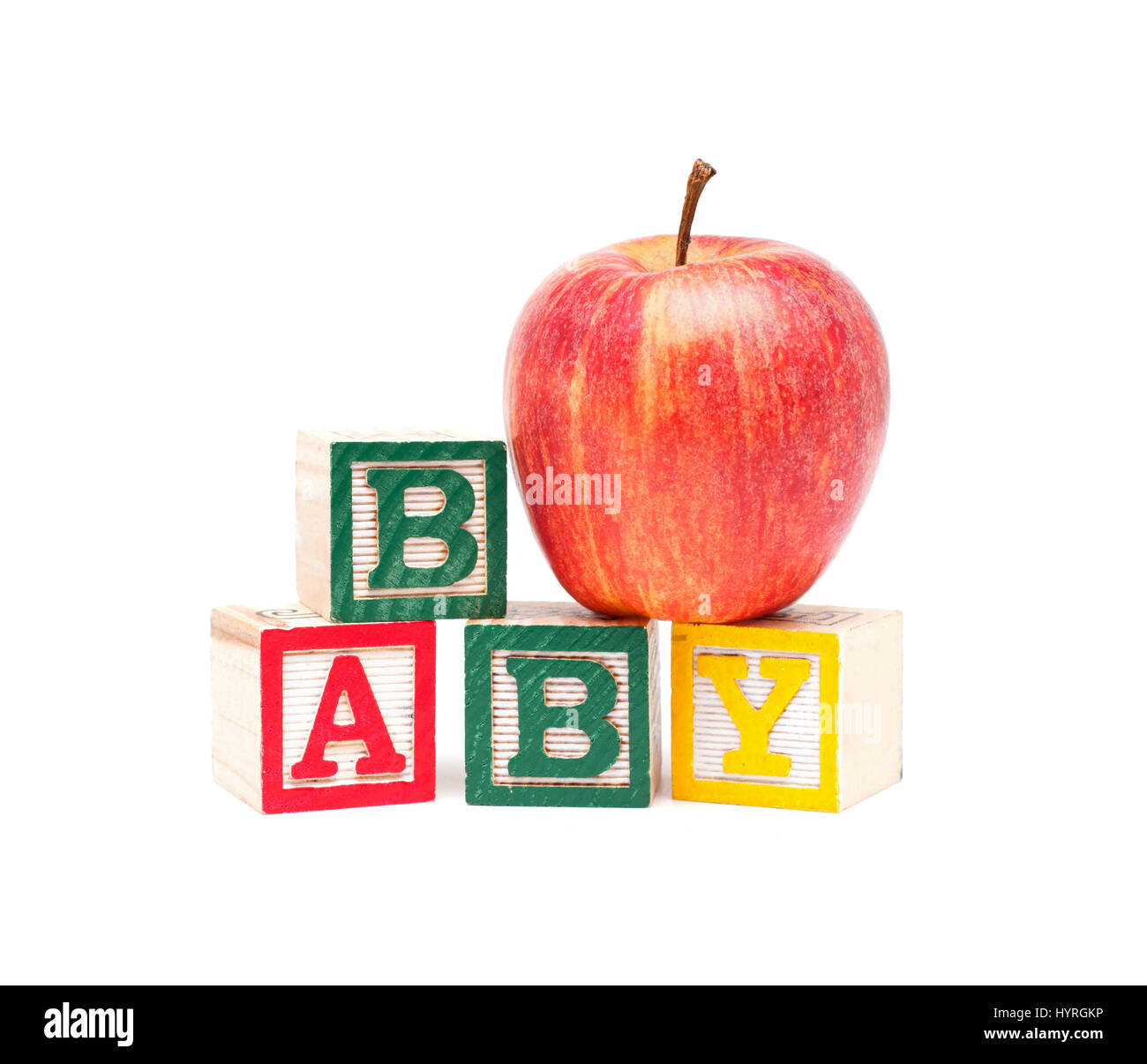 Wooden blocks and apple with baby isolated on white background Stock ...