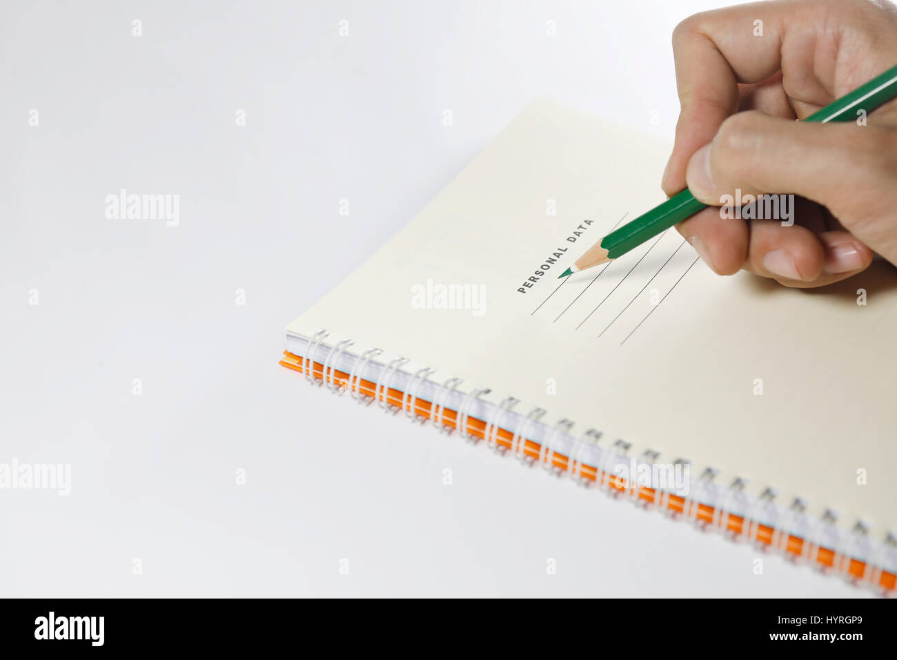 Pencil writting on notebook on white background Stock Photo - Alamy