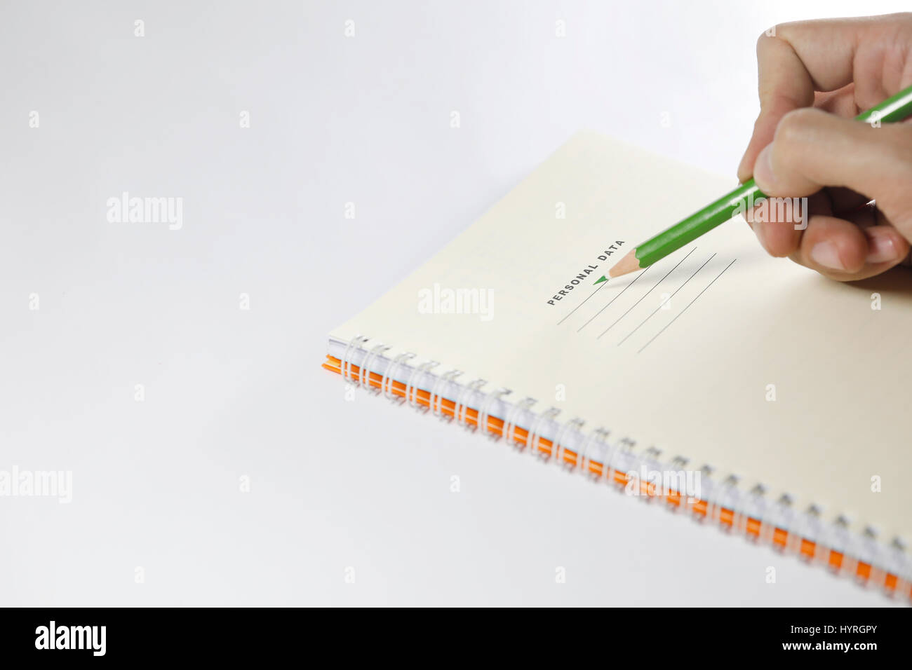 Pencil writting on notebook on white background Stock Photo - Alamy