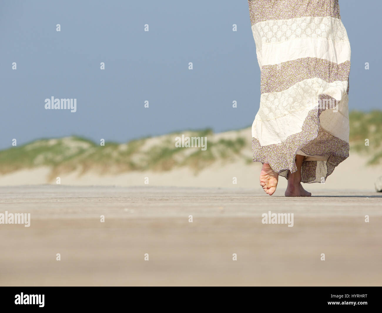 One woman walk barefoot hi-res stock photography and images - Alamy