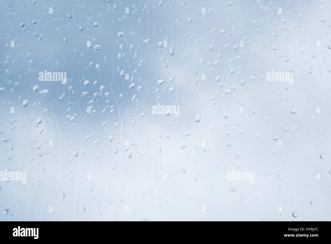 Raindrops on glass, spectacular sky background with some blur Stock ...