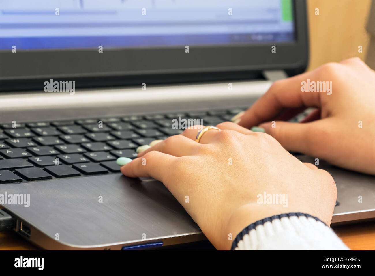 Woman's hand on keyboard Stock Photo - Alamy
