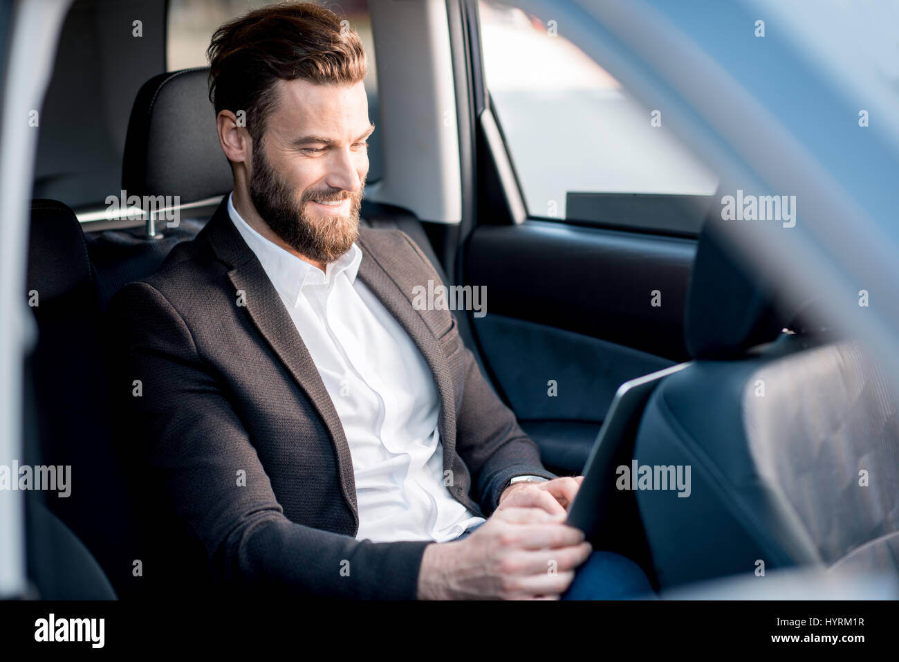 Businessman laptop car hi-res stock photography and images - Alamy