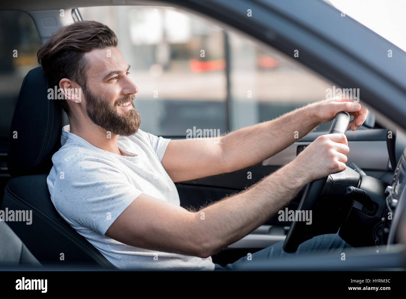 Man driving a car Stock Photo - Alamy