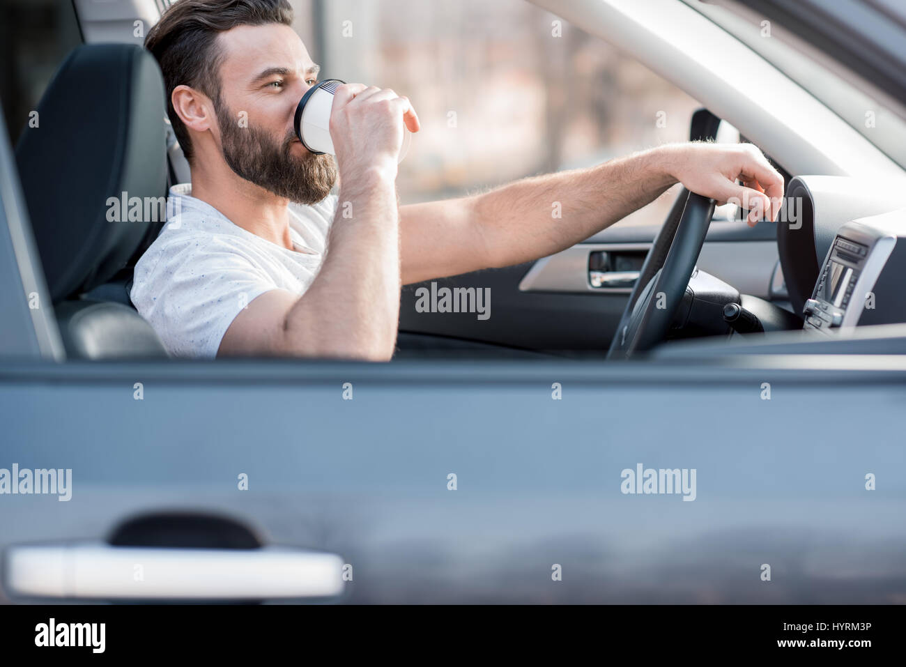 Man driving a car Stock Photo - Alamy