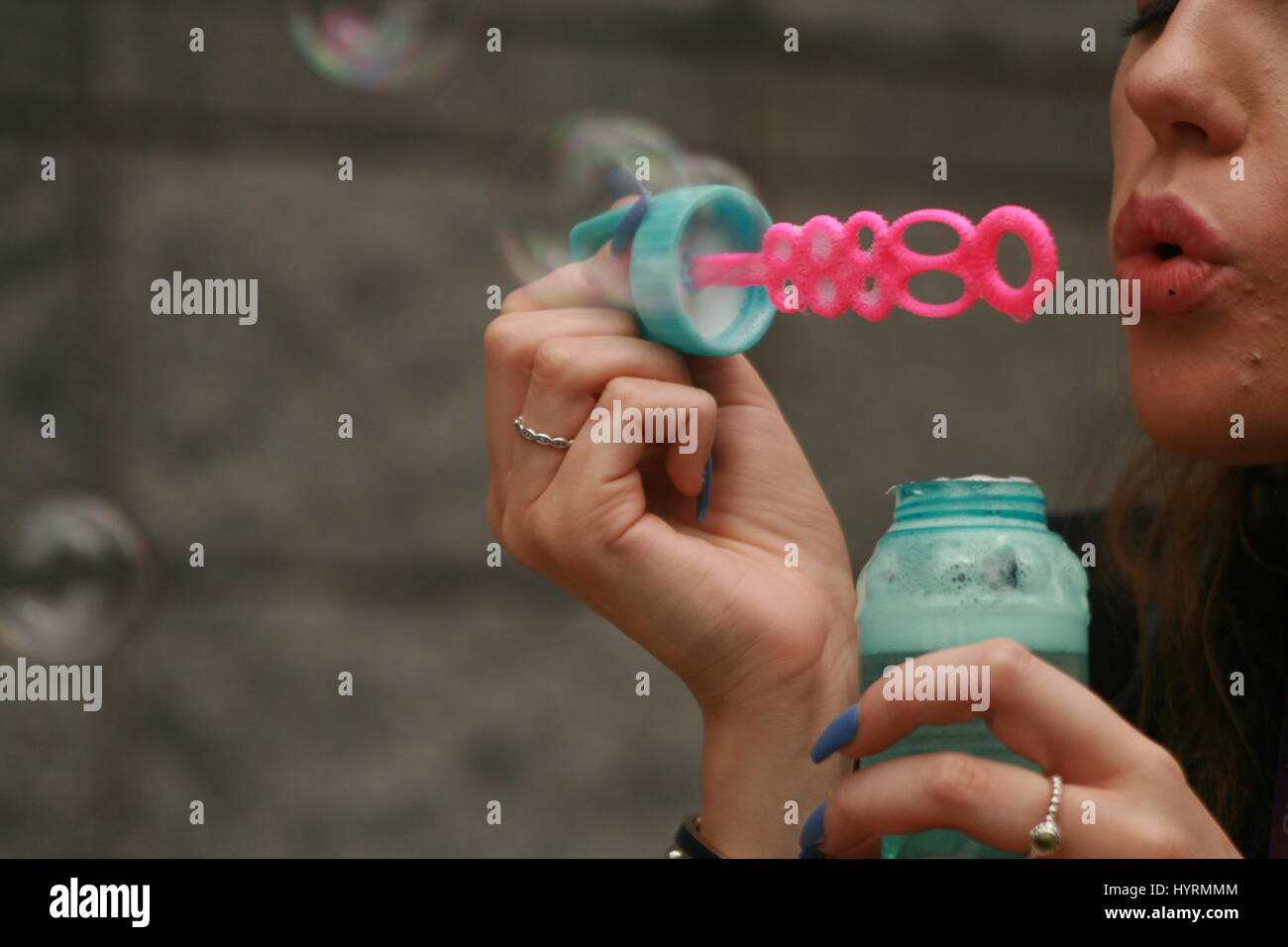 Blowing bubble rings hi-res stock photography and images - Alamy