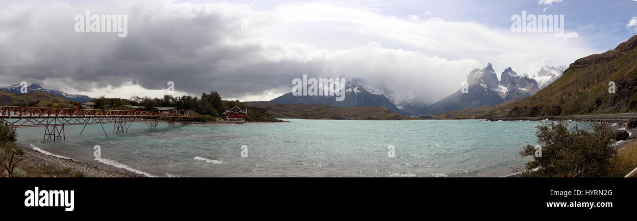 Stunning very wide panoramic view of mountains with a lake Stock Photo ...