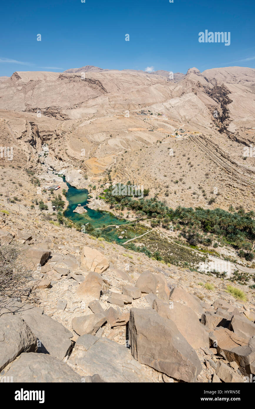 Top vertical view of Wadi Bani Khalid in Oman, with a turquoise pool ...