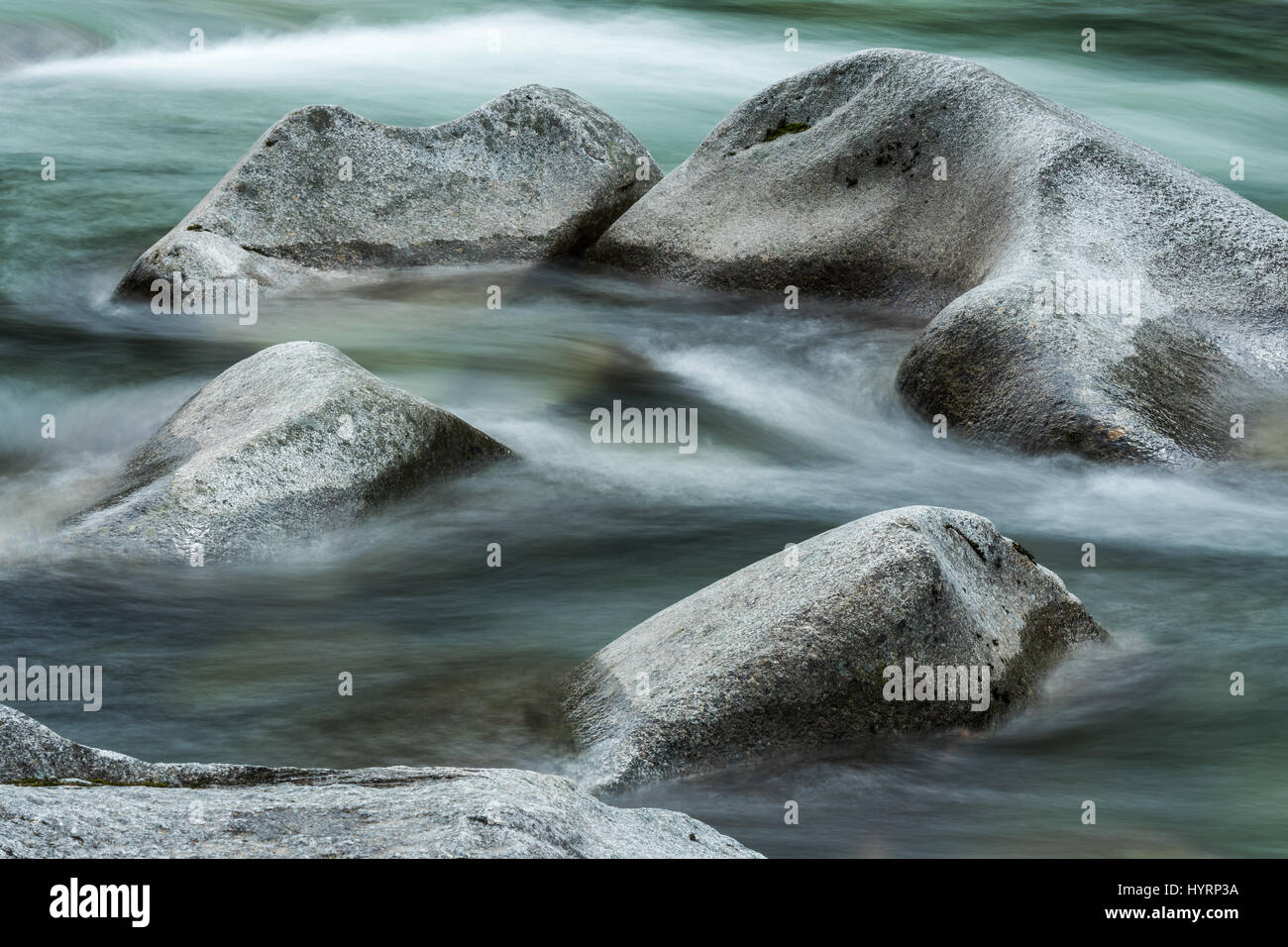 Circle of river stones made smooth by the flowing water of the ...